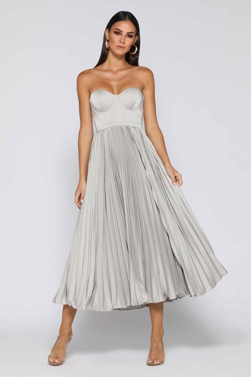 The Milan dress by Elle Zeitoune features a feminine bodice